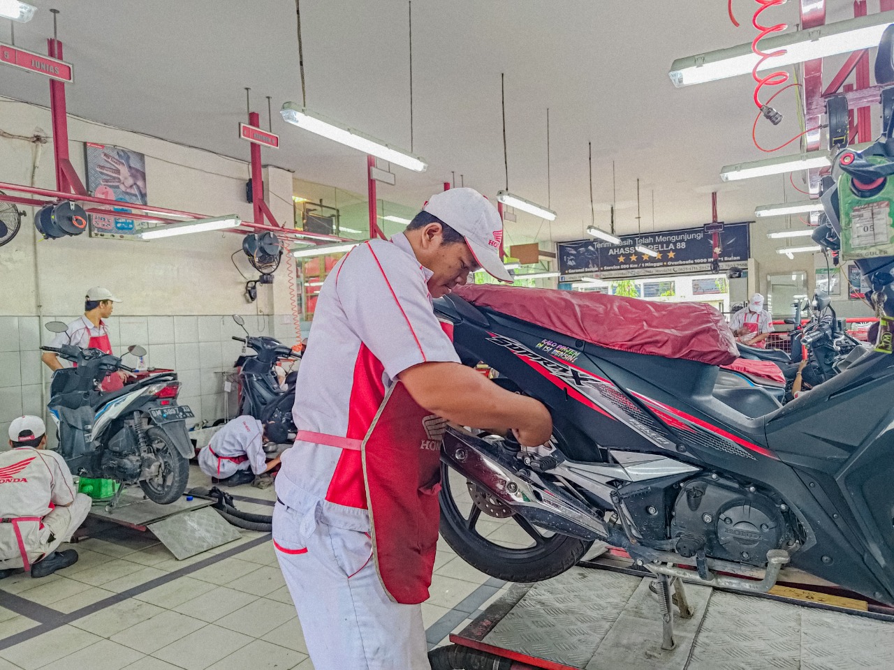 Pentingnya Perawatan Motor Secara Teratur ke Bengkel AHASS - Pekanbaru Pos