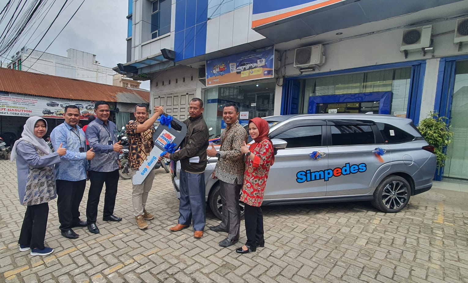 BRI Serahkan Hadiah Grandprize 1 Unit Mobil Toyota Veloz - Pekanbaru Pos